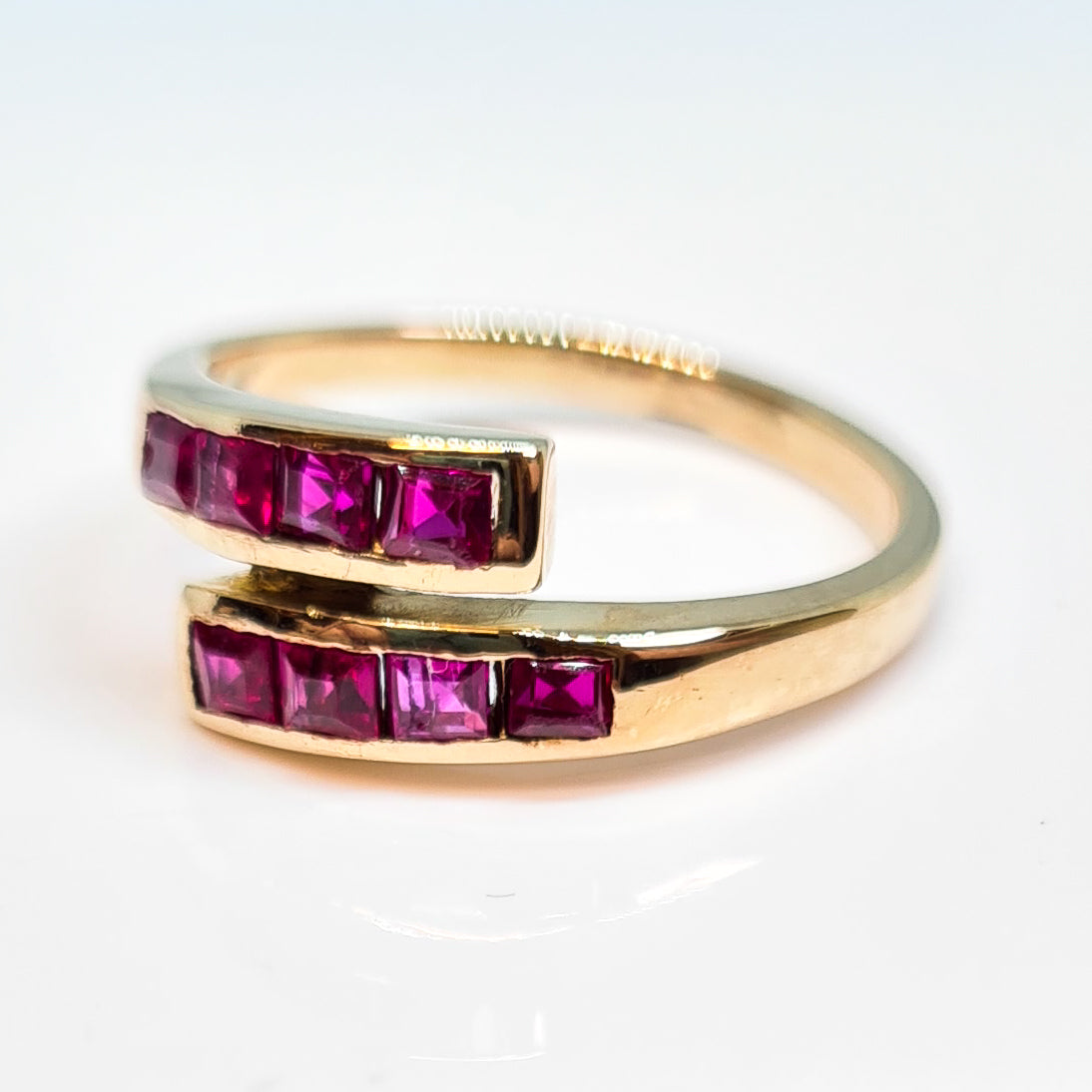 Ruby Cross Over Style Ring – David's Jewellers